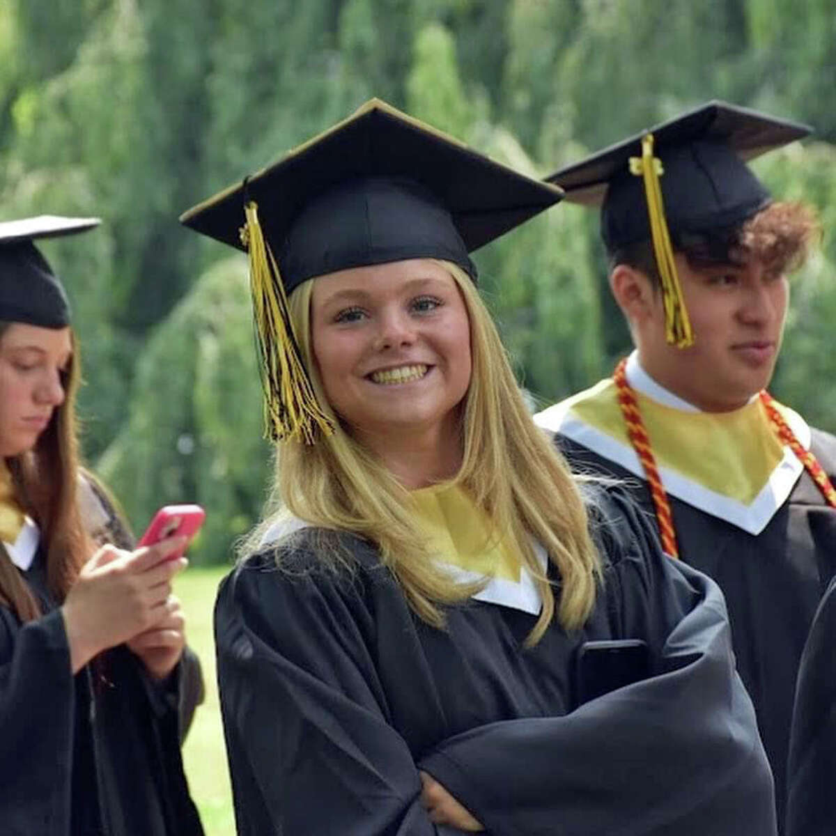 Daniel Hand High class of 2023 graduates under dry skies June 16