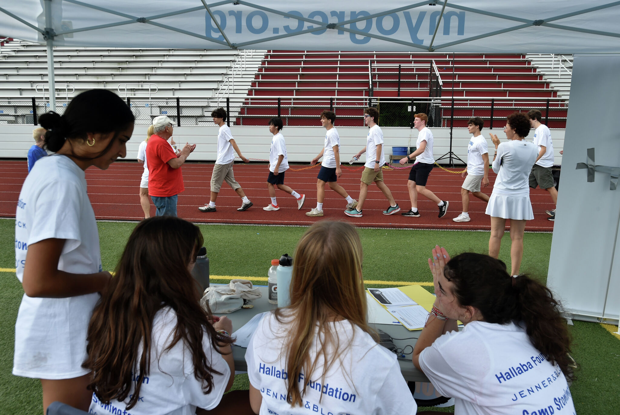 In Photos: Greenwich teen tackles Guinness World Record conga line