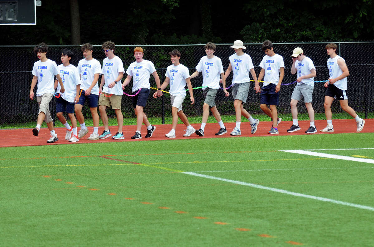 In Photos: Greenwich teen tackles Guinness World Record conga line