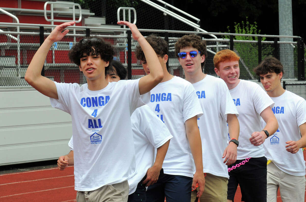 In Photos: Greenwich teen tackles Guinness World Record conga line