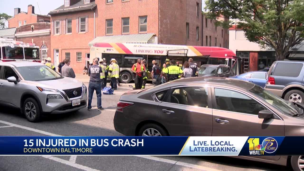 16 injured as Baltimore bus crashes into 2 cars, apartment building