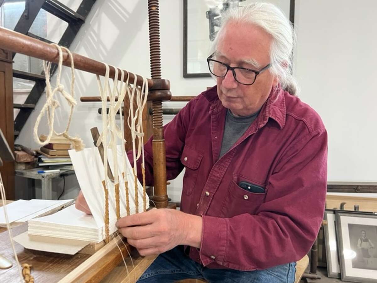 Tim James' quest to bring 19th-century bookbinding back to Troy