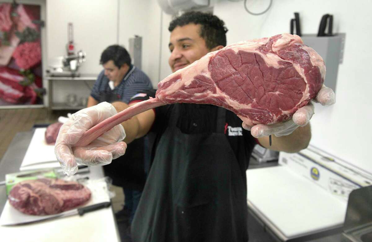 Father, son from Brazil open Tomahawk Meat Market in Danbury