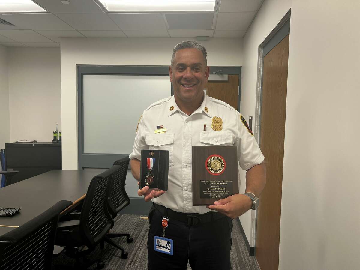 UConn, East Hartford firefighter inducted into Hall of Fame