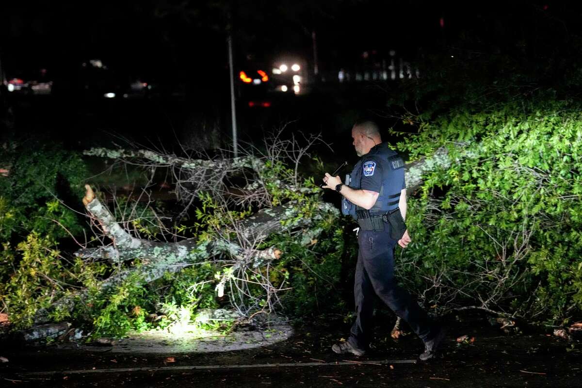 Photos of damage from Houston-area storm with hurricane-force winds