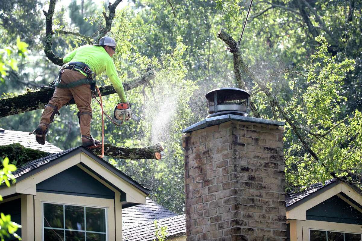 Photos of damage from Houston-area storm with hurricane-force winds