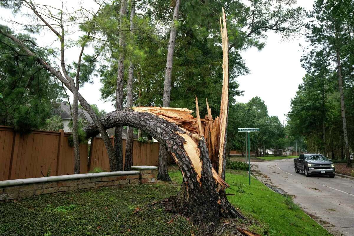 Photos of damage from Houston-area storm with hurricane-force winds