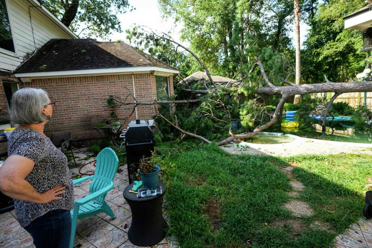 Photos of damage from Houston-area storm with hurricane-force winds