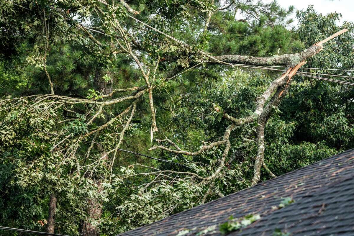 Photos of damage from Houston-area storm with hurricane-force winds