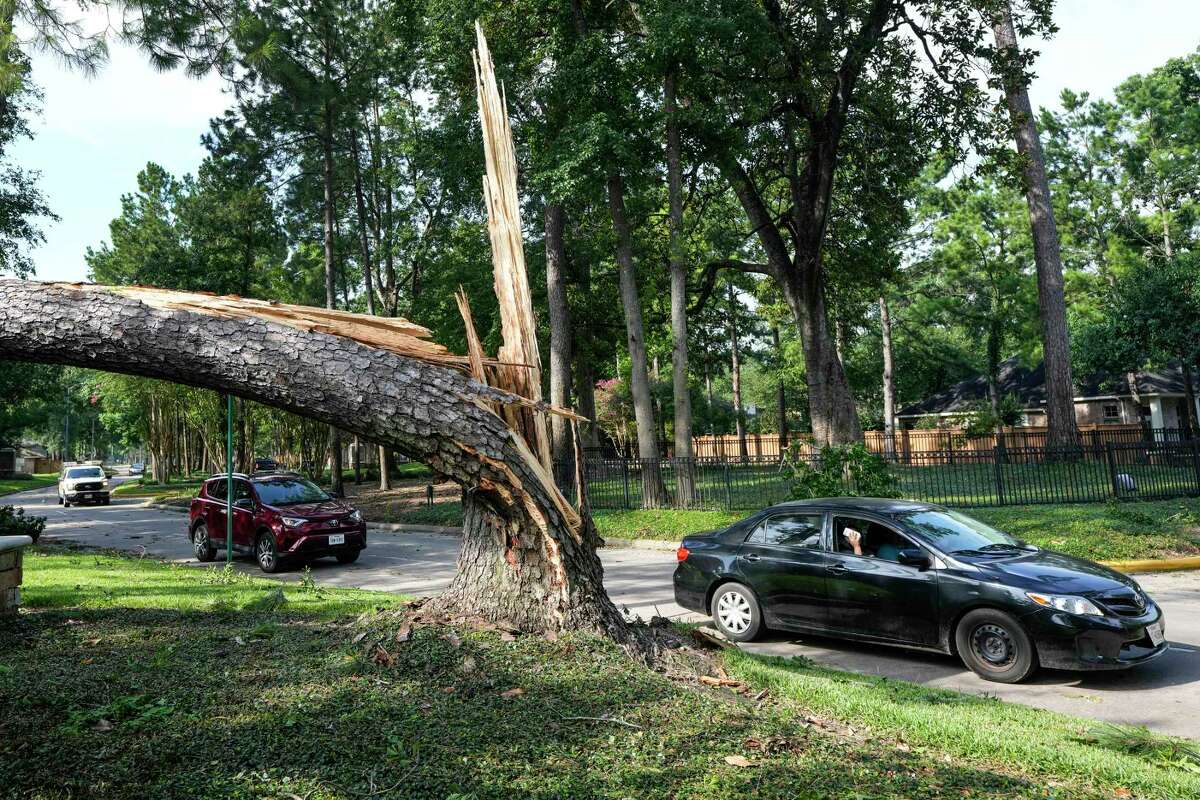 Photos of damage from Houston-area storm with hurricane-force winds