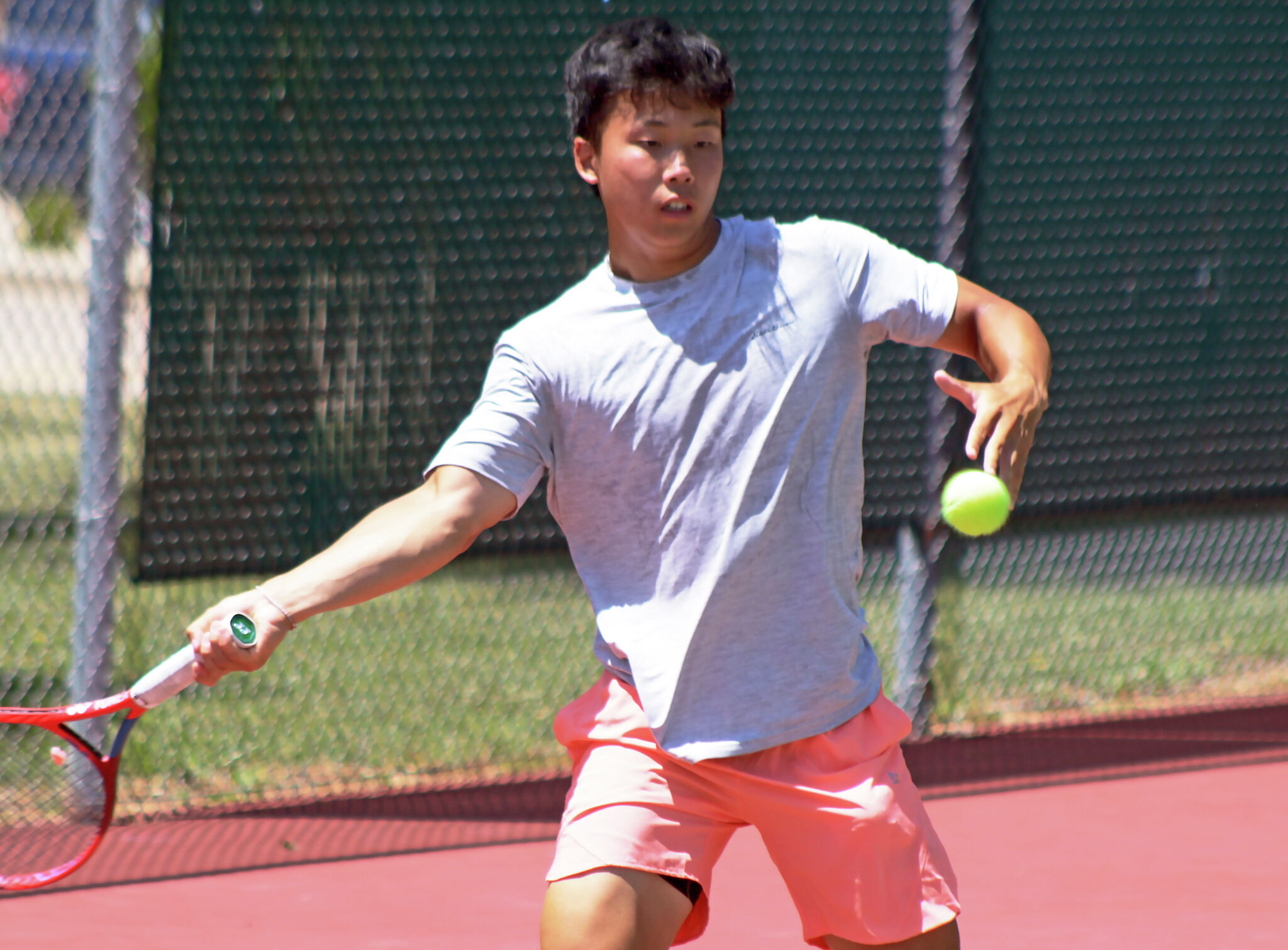 Hunter Heck battles cramps, wins singles title at Edwardsville Open