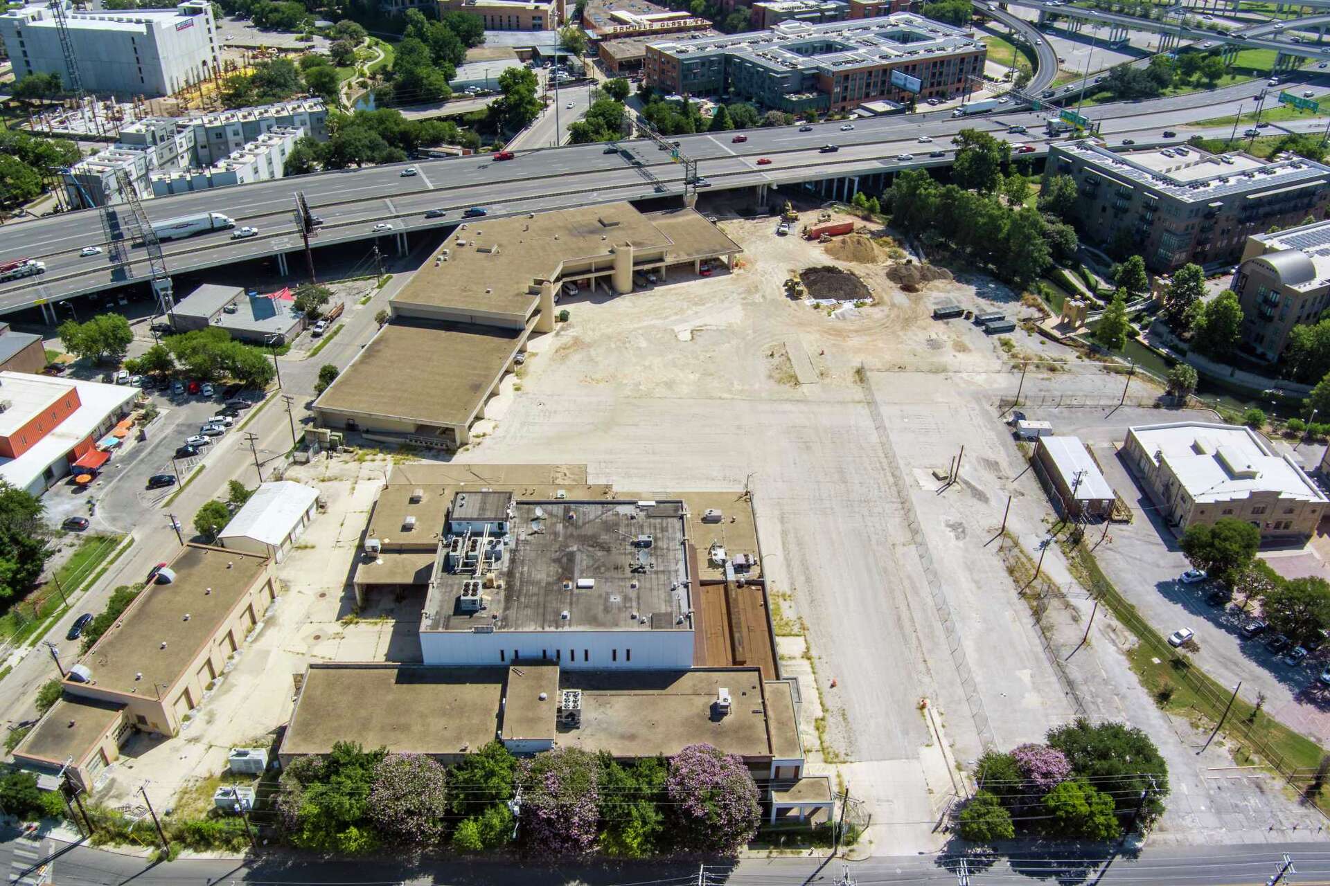 McCombs’ company to raze buildings next to art museum for development