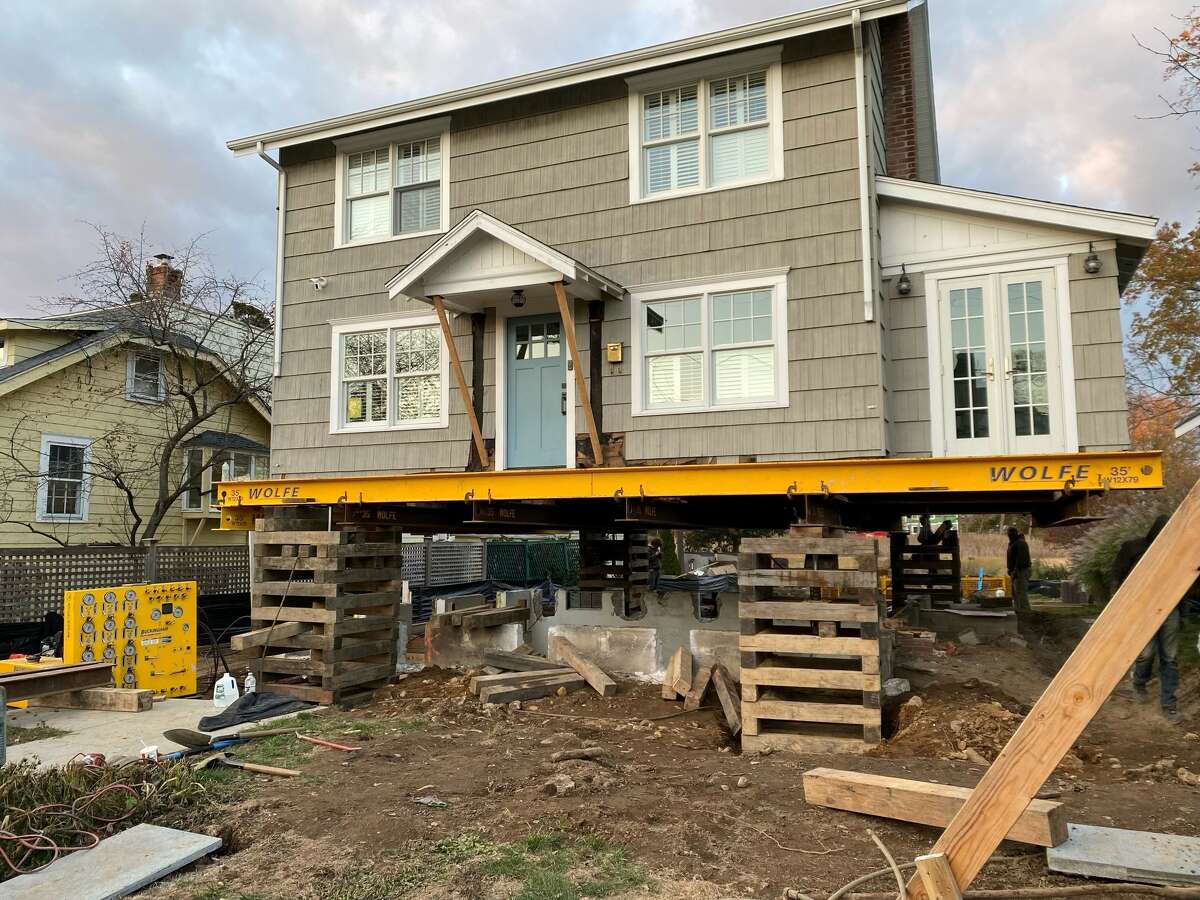 Greenwich family spent about $500,000 to lift home after flooding