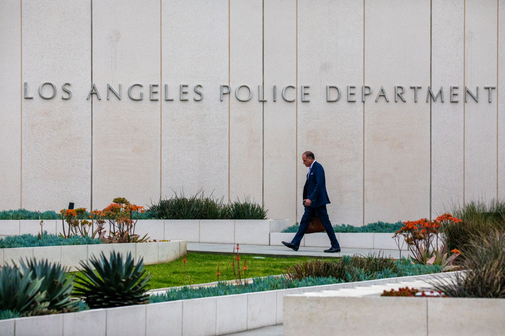 Instagram-famous LAPD officer wields guns in her wedding photos