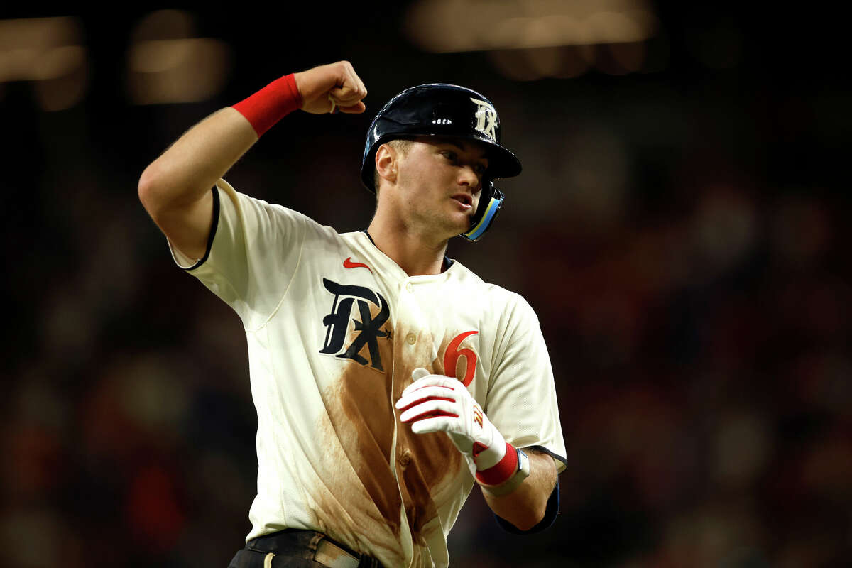Mauricio Dubón leads Houston Astros past Texas Rangers in opener