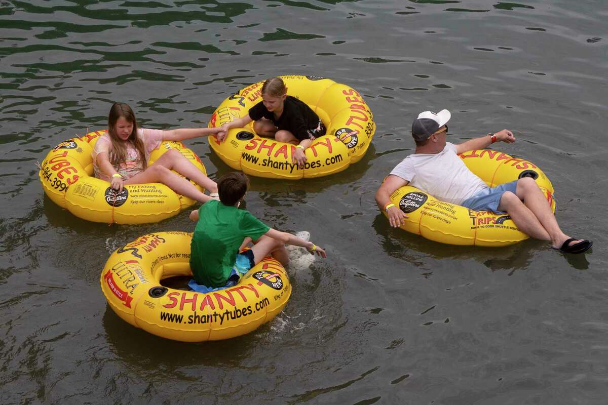 Photos: Tubing along Guadalupe River on hot July day lures in Texans