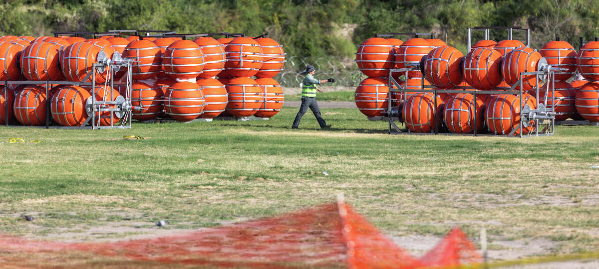 Texas puts border barrier buoys, nets in Rio Grande to deter crossings Texas puts border barrier buoys, nets in Rio Grande to deter crossings