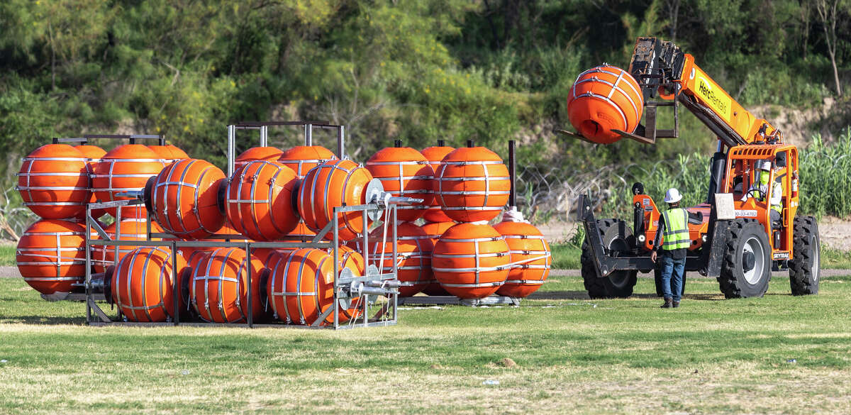 Texas puts border barrier buoys, nets in Rio Grande to deter crossings Texas puts border barrier buoys, nets in Rio Grande to deter crossings