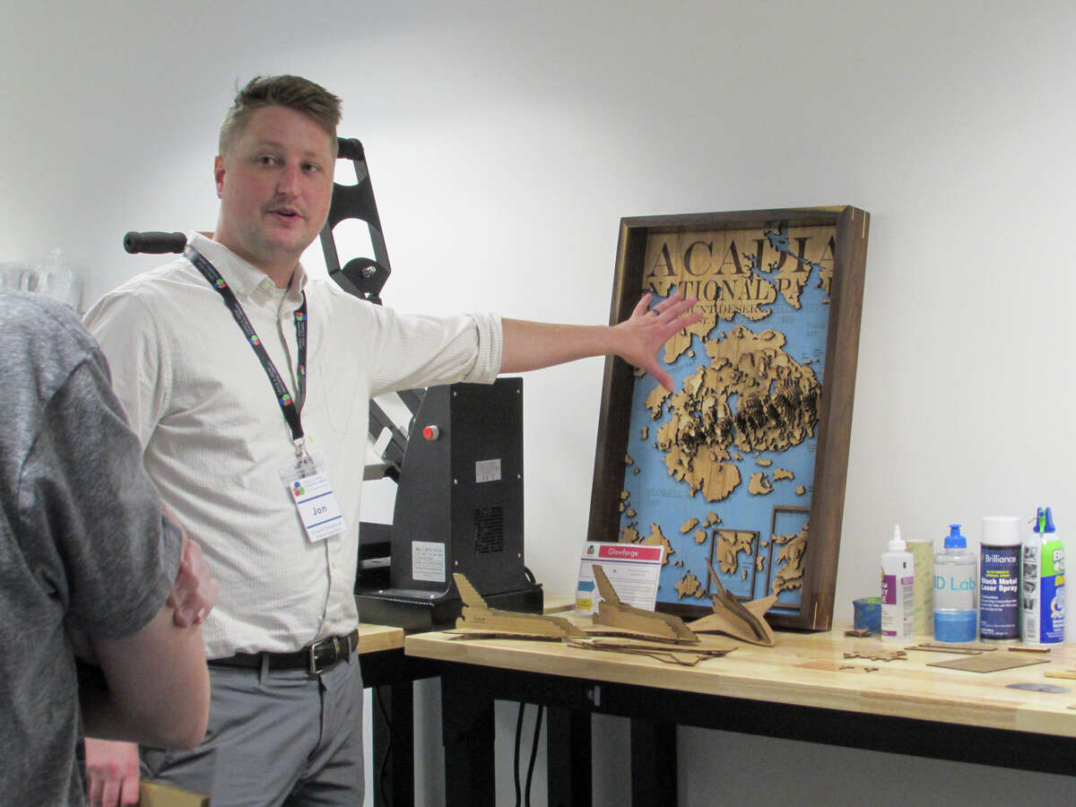 Laser-cut wooden cactus craft draws 20 teens to Midland library