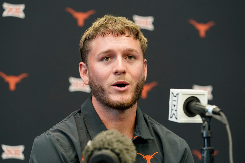 Texas QB Quinn Ewers embracing his role as 'head of the snake'