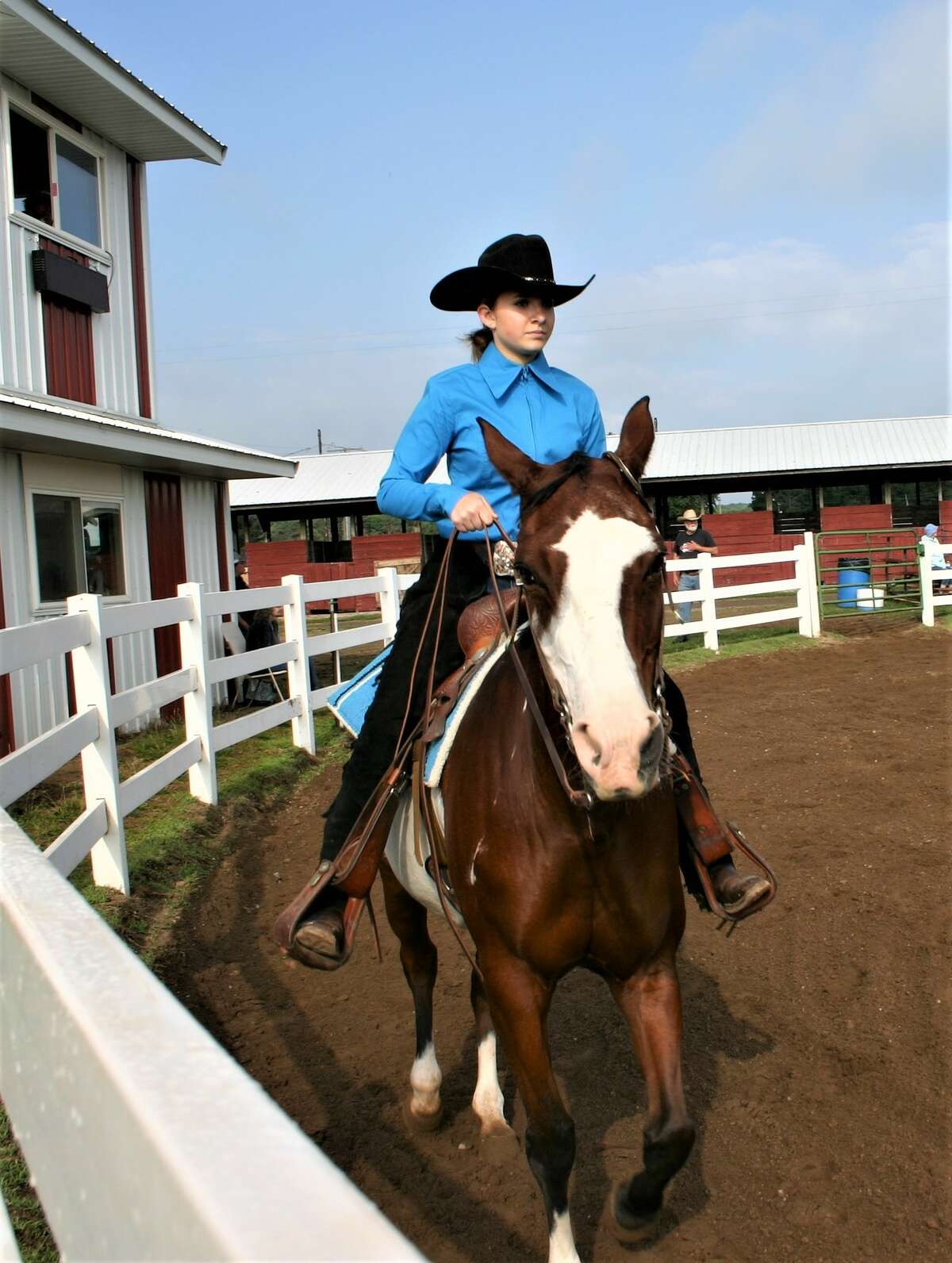 Mecosta County 4-H demonstrate horse riding skills at fair