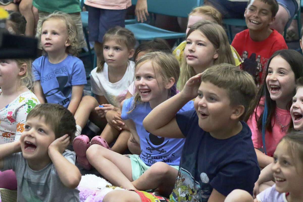 Children all smiles for Chef Bananas at Edwardsville library