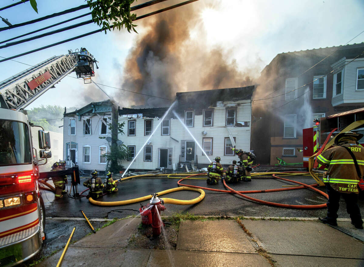 Troy firefighters battle blaze in South Troy row house on Stow Avenue