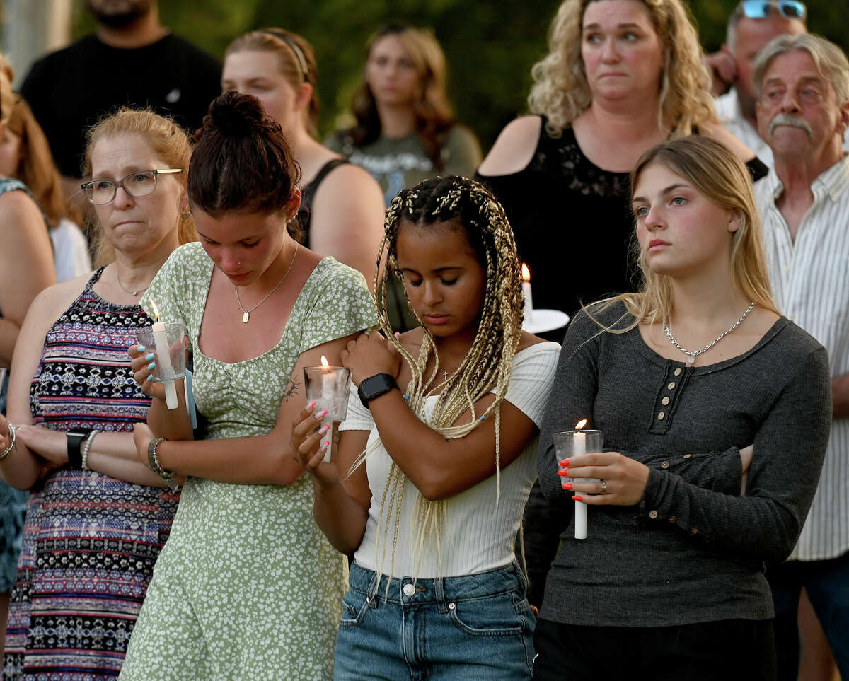 Hundreds mourn deaths of young man, teen killed in Glastonbury crash