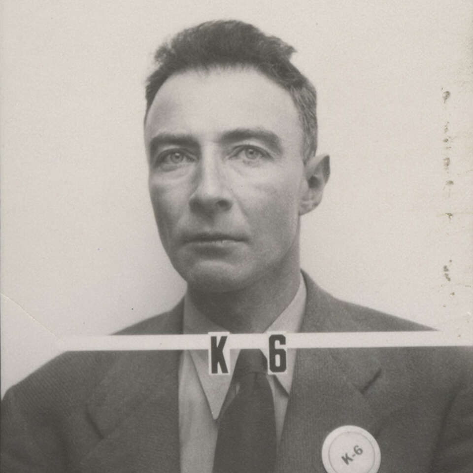 What are the white badges they’re wearing in 'Oppenheimer'?