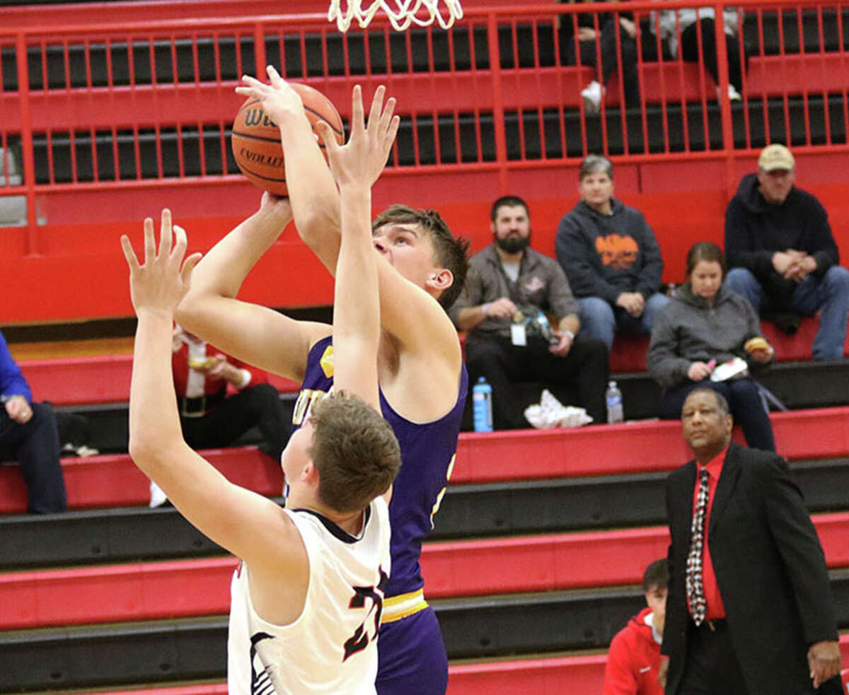 It's basketball, no matter the height, for CM 7-footer Buckley