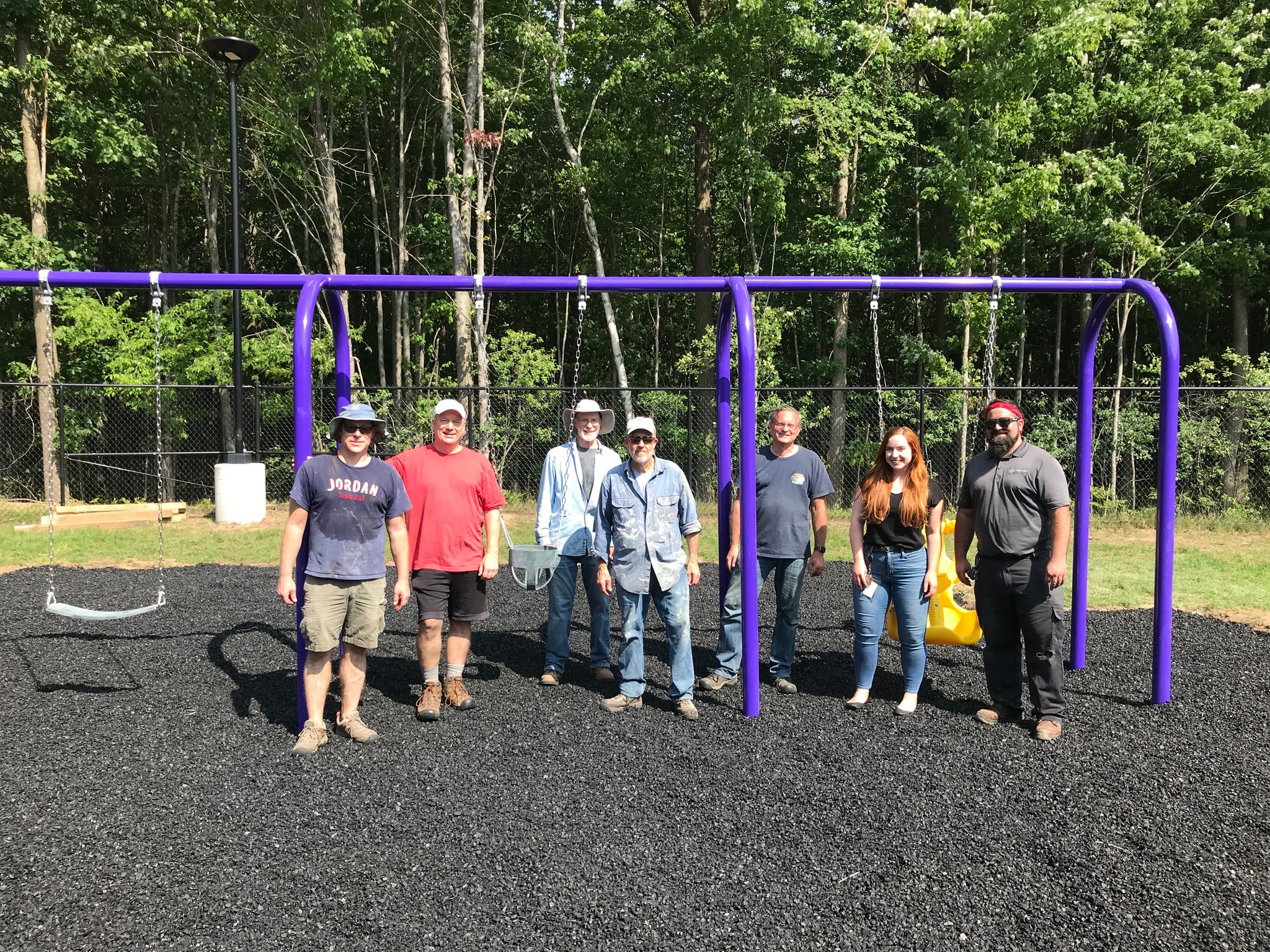 Midland Kiwanis Club built a swing set for Shelterhouse children