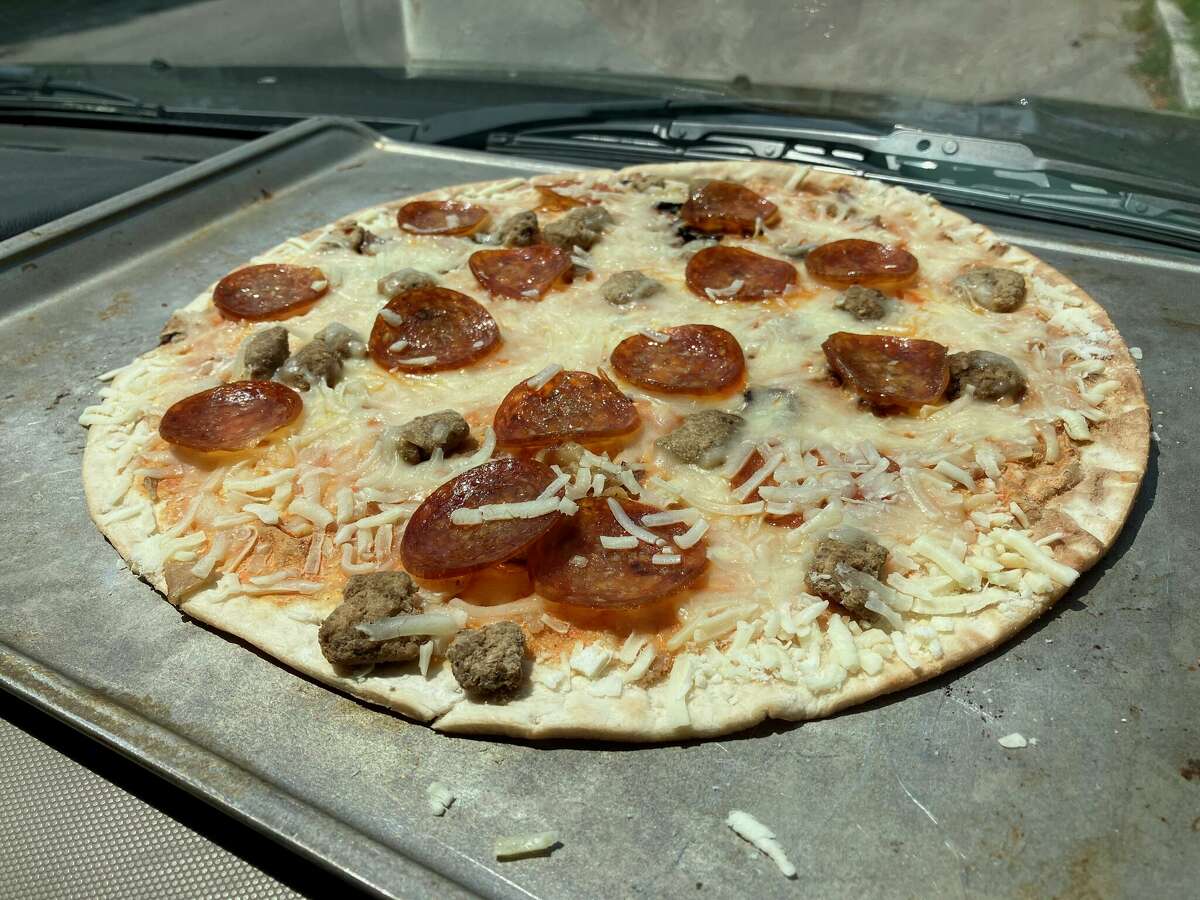 I used the St. Louis heat to cook a frozen pizza on my car's dashboard