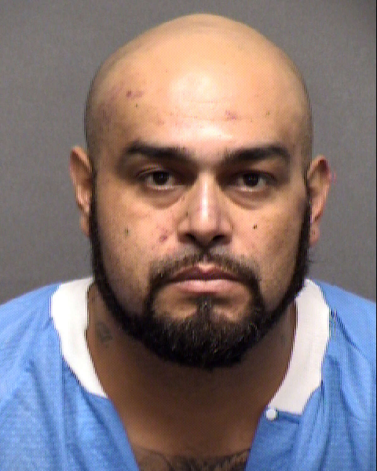 Man who carjacked, ran over victim changing a tire gets 35 years