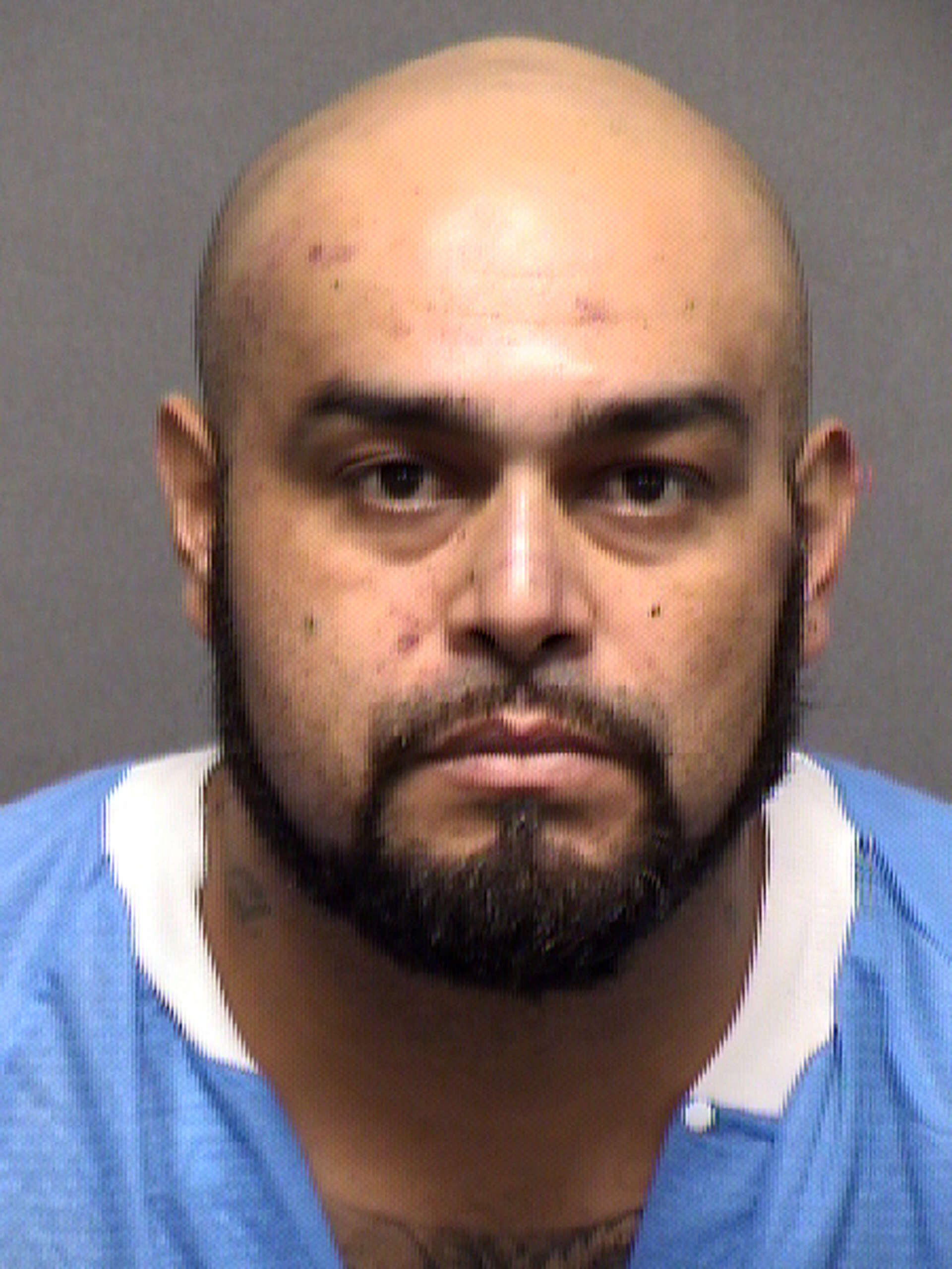 Man who carjacked, ran over victim changing a tire gets 35 years