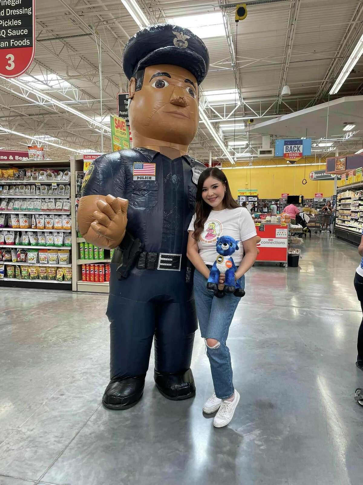 Children meet law enforcement mascots at H-E-B Kid's Day!