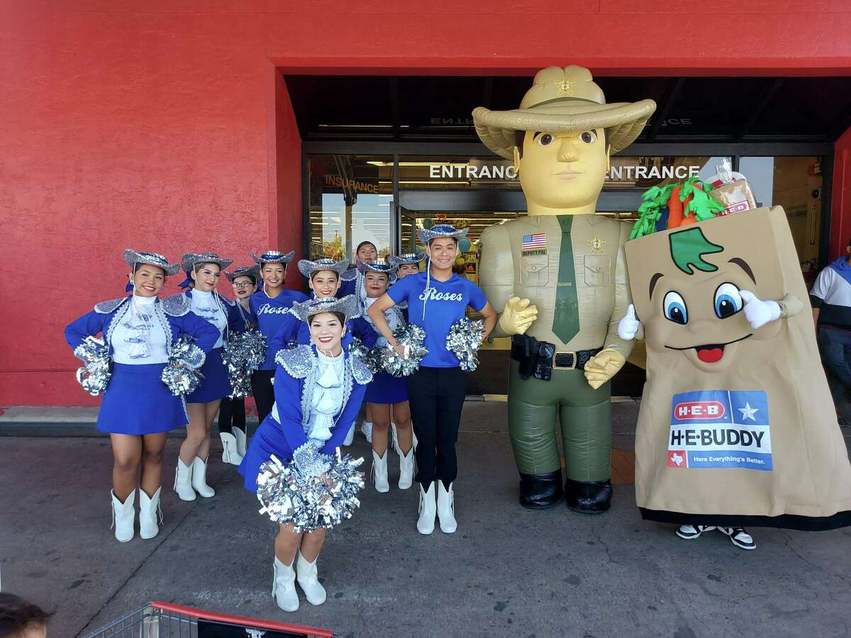 Children meet law enforcement mascots at H-E-B Kid's Day!