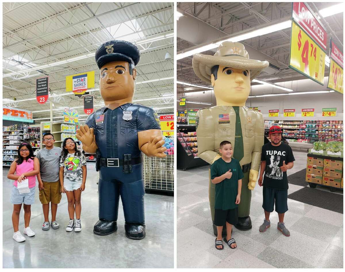 Children meet law enforcement mascots at H-E-B Kid's Day!