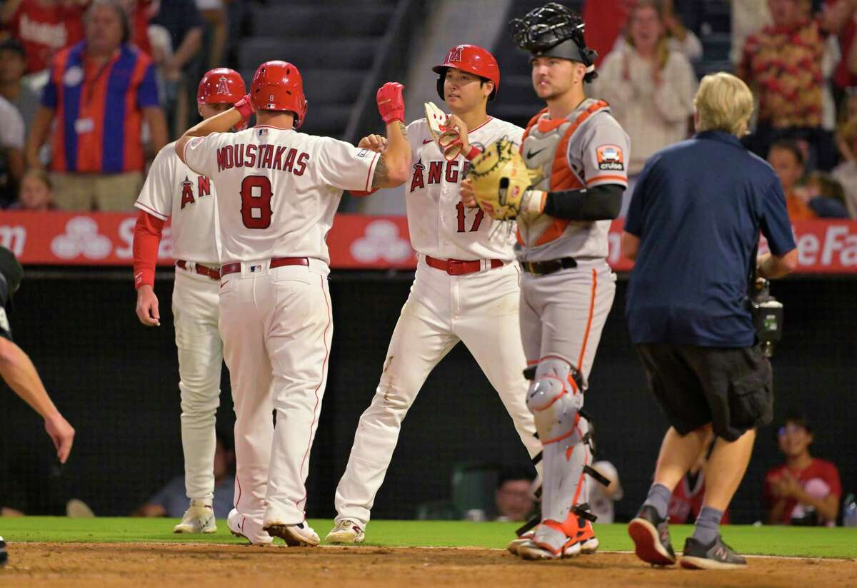 Ohtani hardly dominant but has enough to beat road-weary Giants