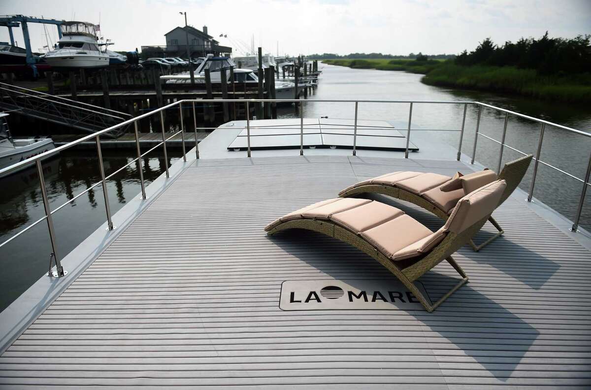 See houseboat living at Clinton Harborside Marina