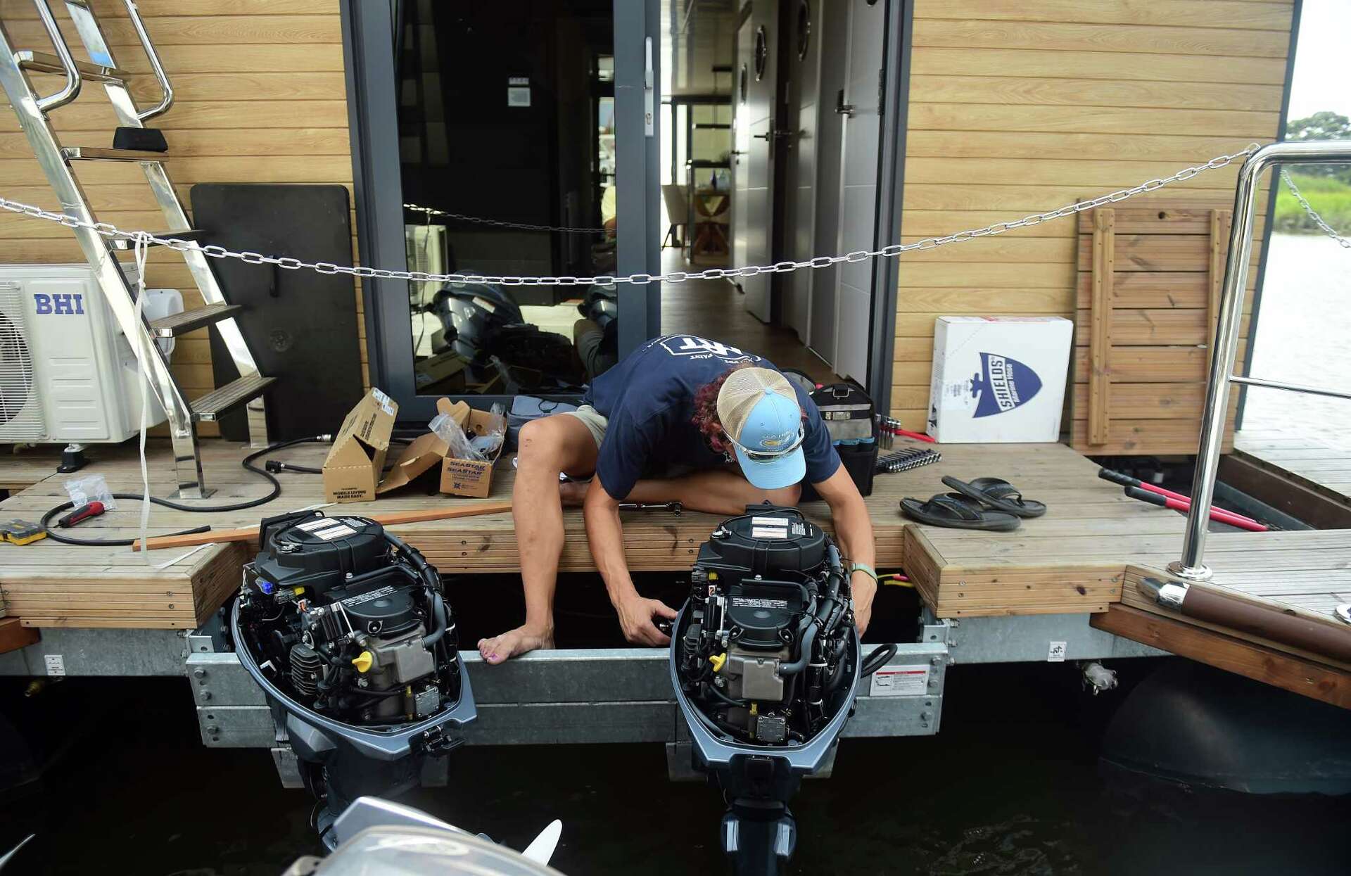See houseboat living at Clinton Harborside Marina