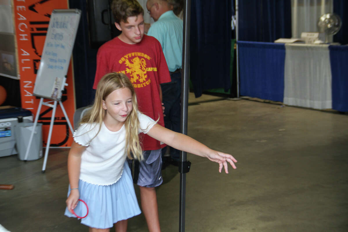 Midland County Fair is underway, fairgoers enjoy Merchant's Day