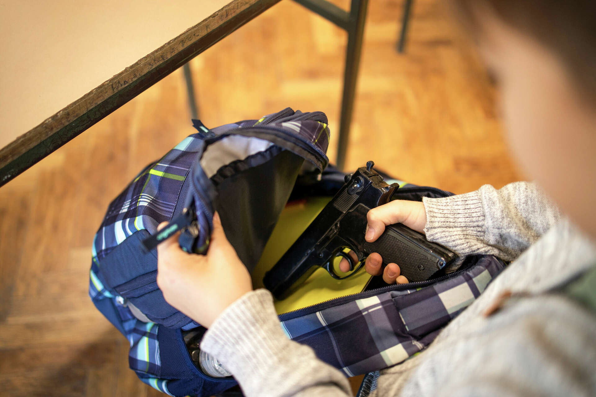 Texas father arrested after gun found inside child's backpack