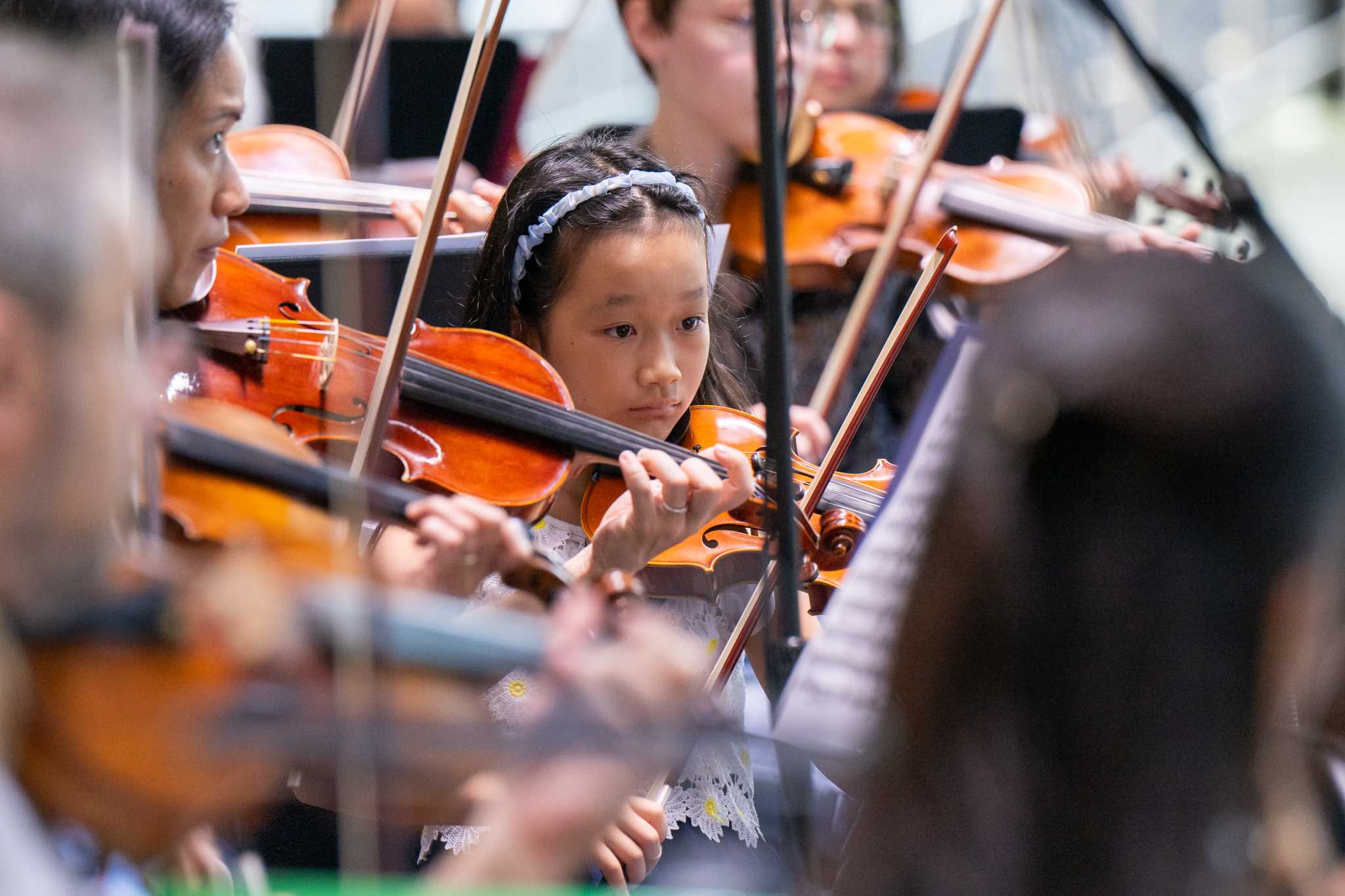 Photos: Local violinists join Philadelphia Orchestra