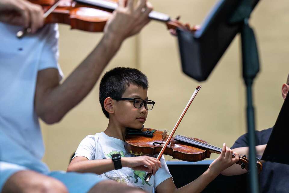 Photos: Local violinists join Philadelphia Orchestra