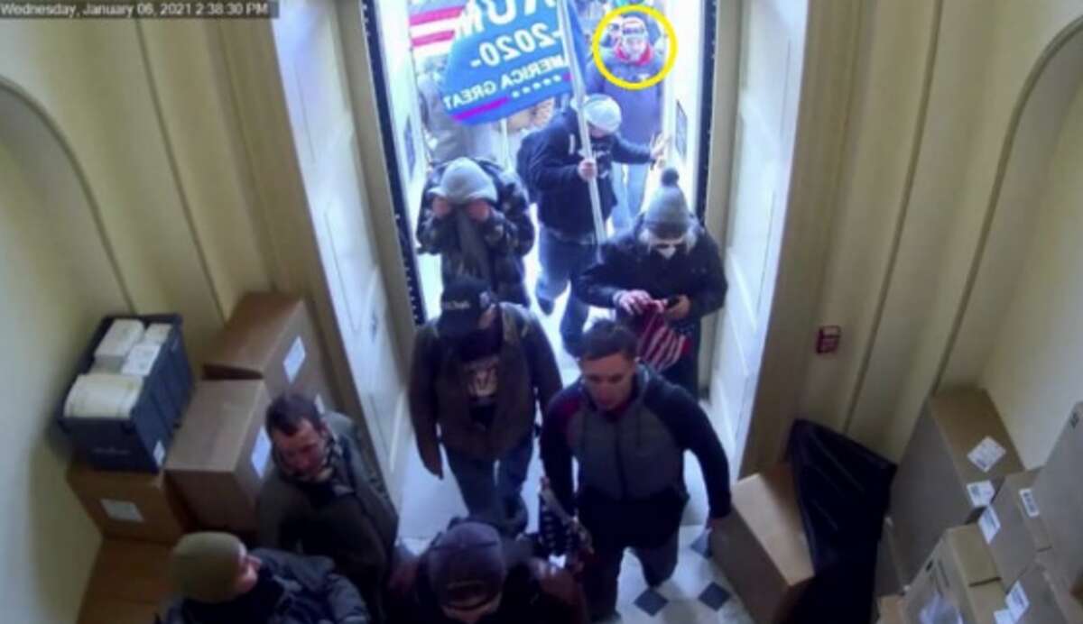 Warrant: Derby official was 'parading' in Capitol during Jan. 6 riot