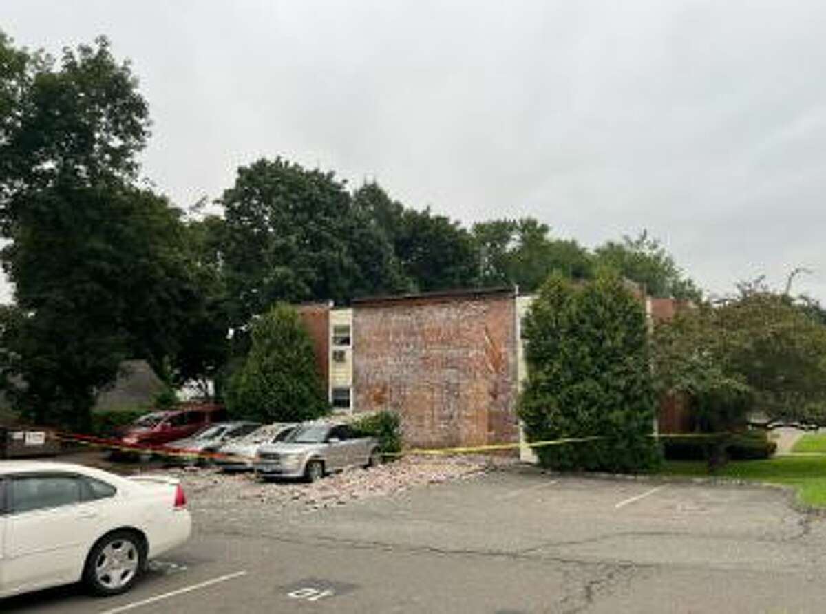 Bricks fall from Manchester condo wall onto cars, official says