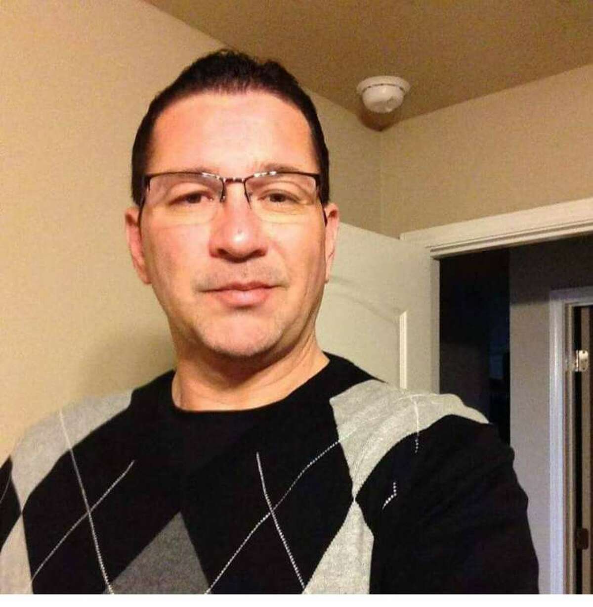 Murder sentence reduced 30 years in death of middle school coach