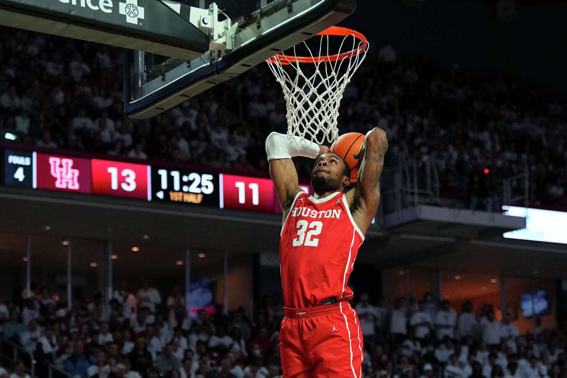 College basketball mourns death of Houston's Reggie Chaney