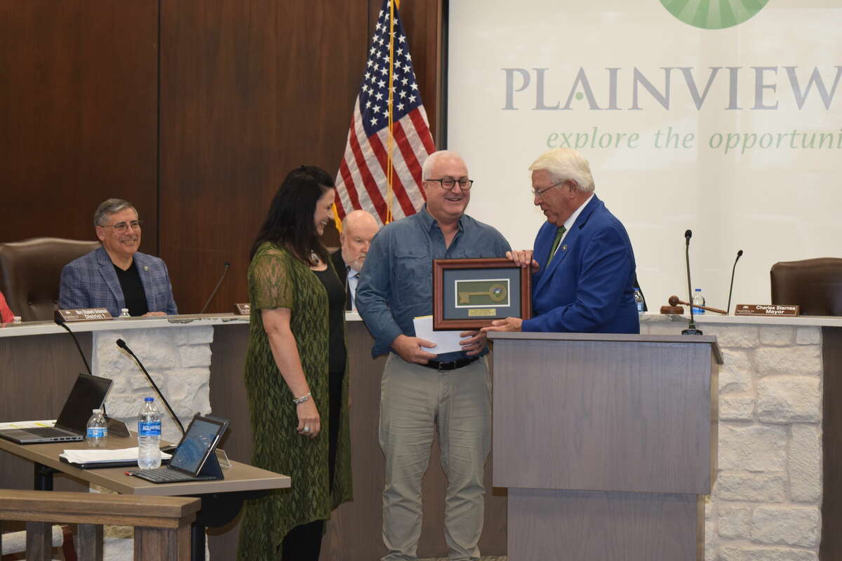 Stacie, Tim Hardage recognized for years of service through Rocket Avi