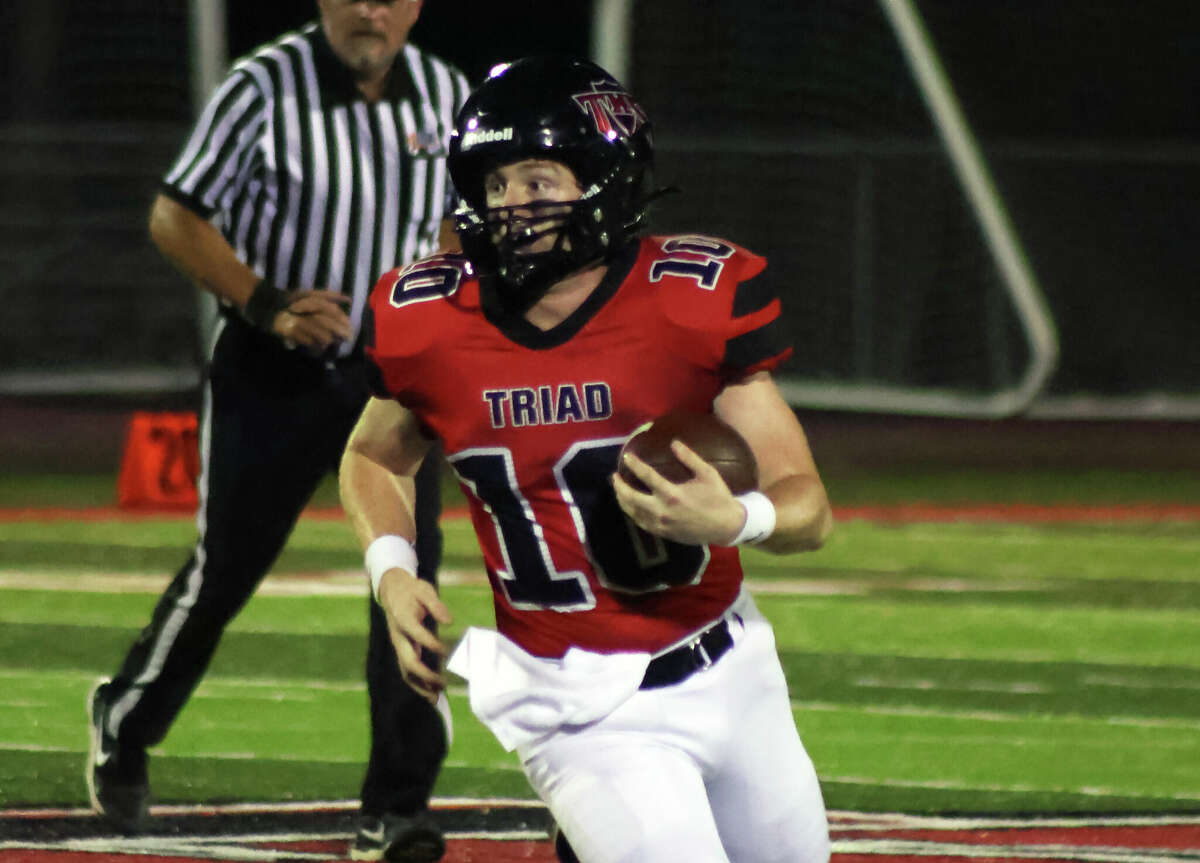 Qualls, Ackerman combine for seven touchdowns in Triad’s rout